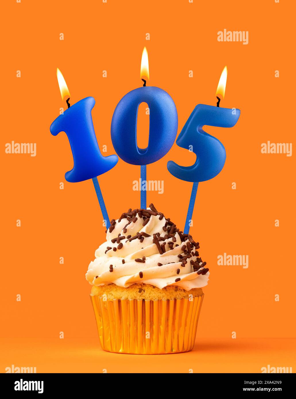 Blue candle number 105 - Birthday cupcake on orange background Stock ...