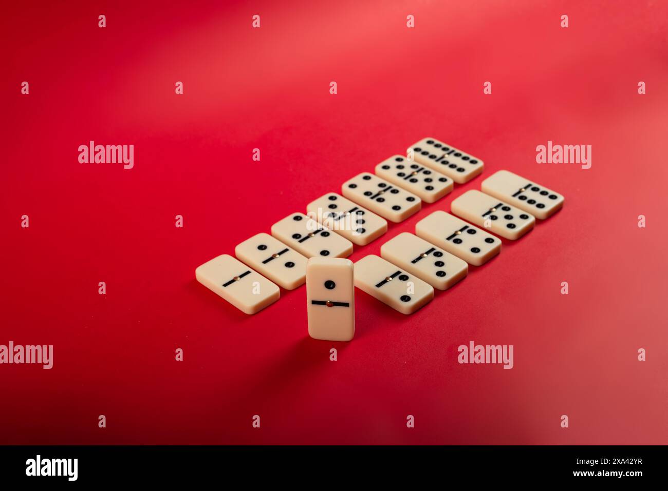 Dominoes with red background, copy space and various angles, board ...
