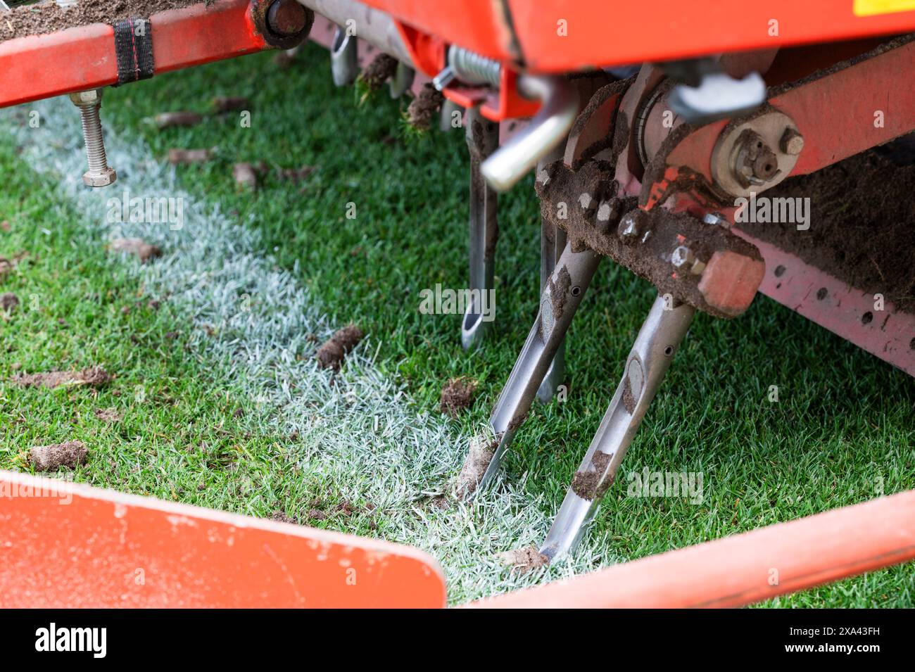 Detail of aeration machine during grasslands football field Stock Photo ...