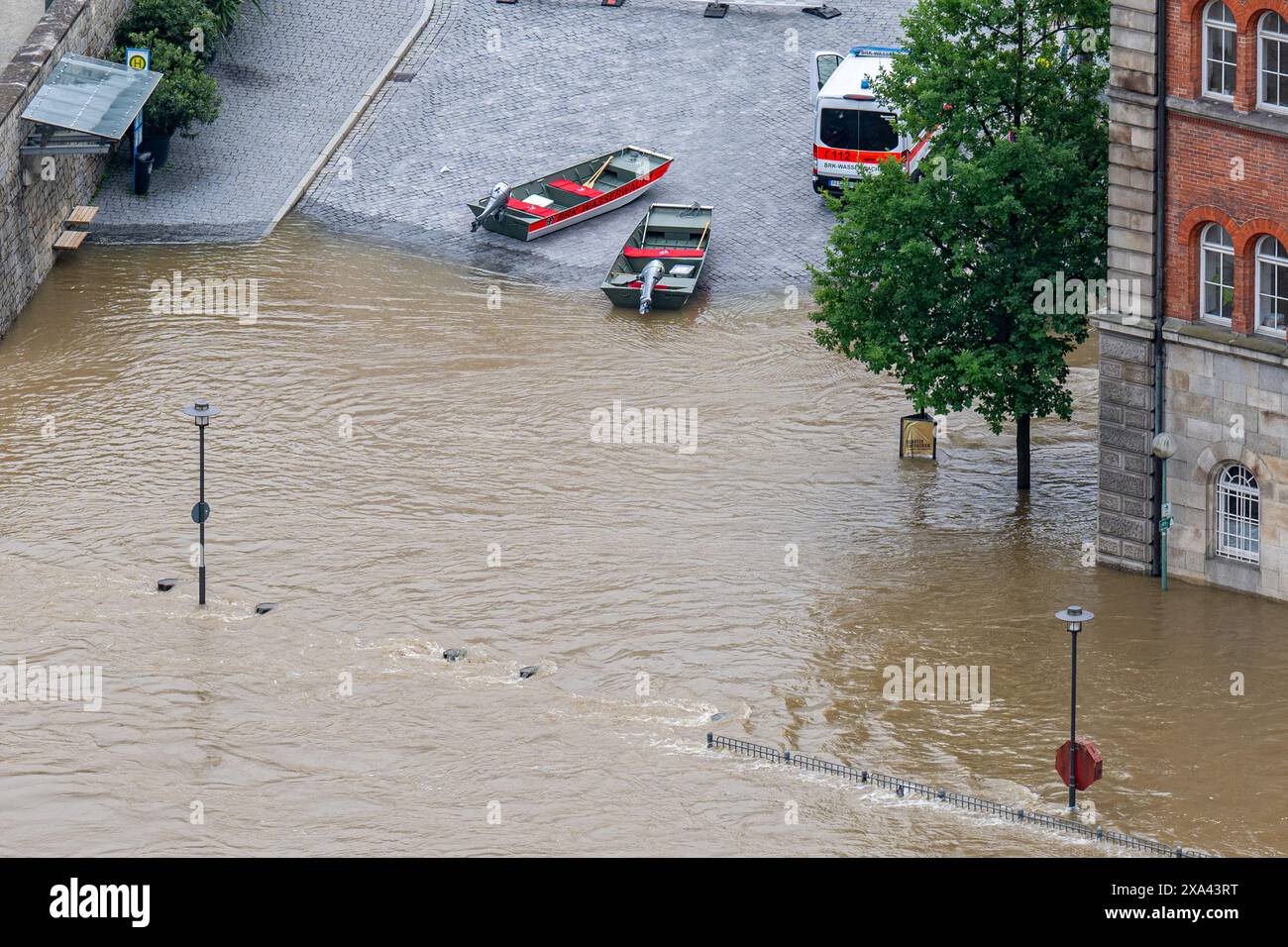 Passau, Germany. 04th June, 2024. Rescue boats lie on the flooded ...