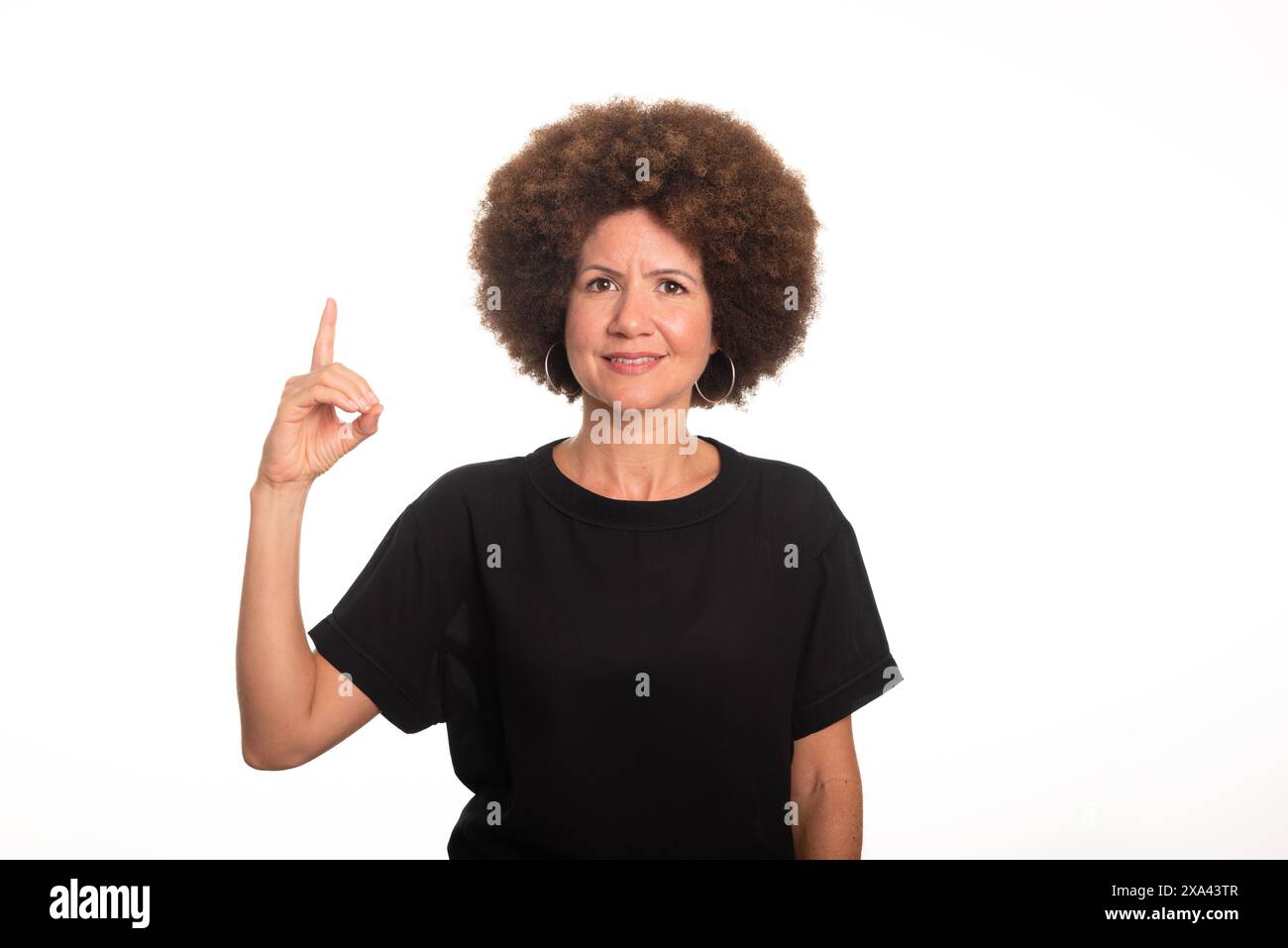 Interpreter of the Brazilian sign language, Libras, making the letter D ...