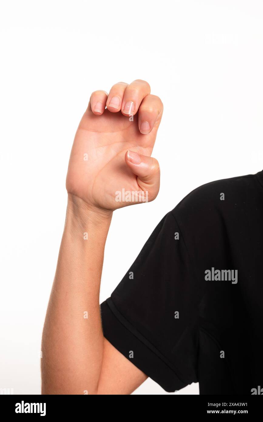Close-up of a female arm and hand making the letter E in the Brazilian ...