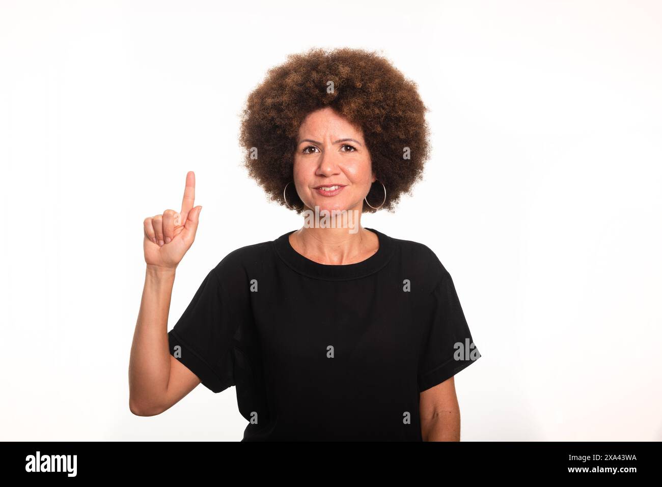 Female interpreter of the Brazilian sign language, Libras, making the ...