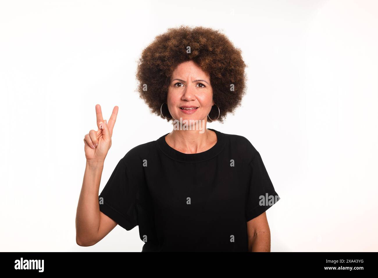 Female interpreter of the Brazilian sign language, Libras, making the ...