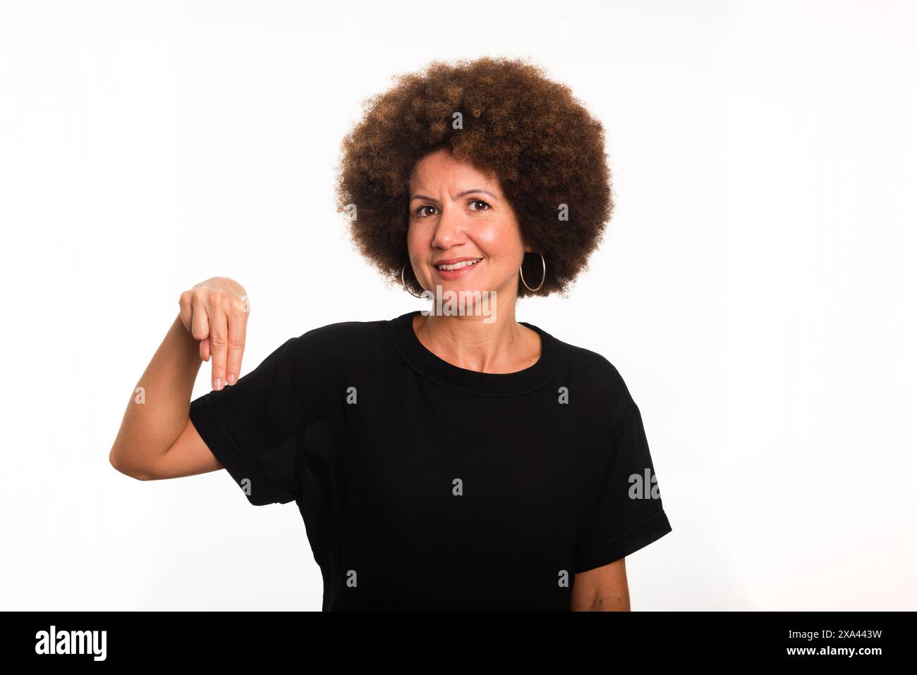 Female interpreter of the Brazilian sign language, Libras, making the ...