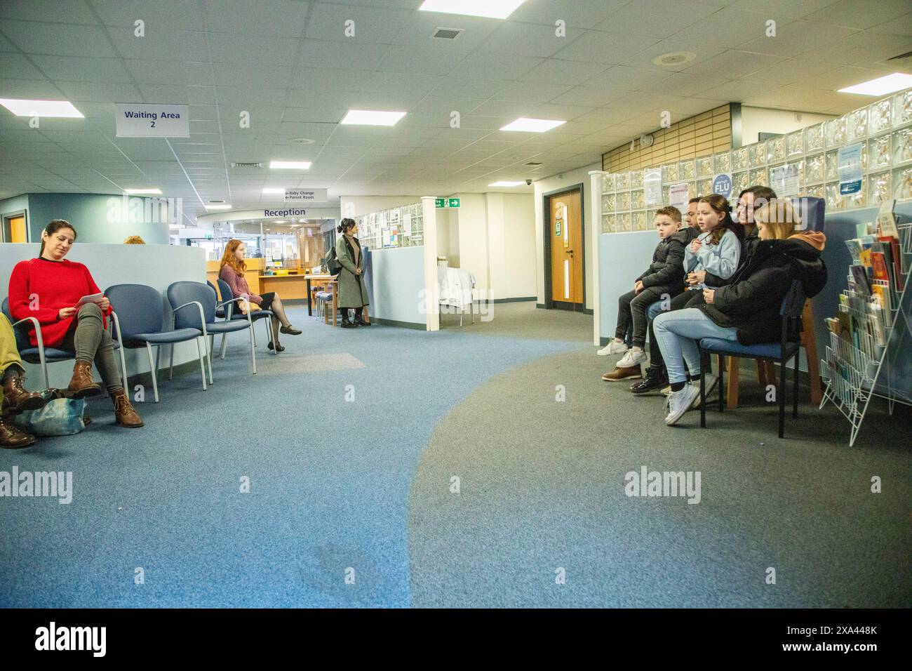 People waiting in a waiting room of a medical practice Stock Photo - Alamy