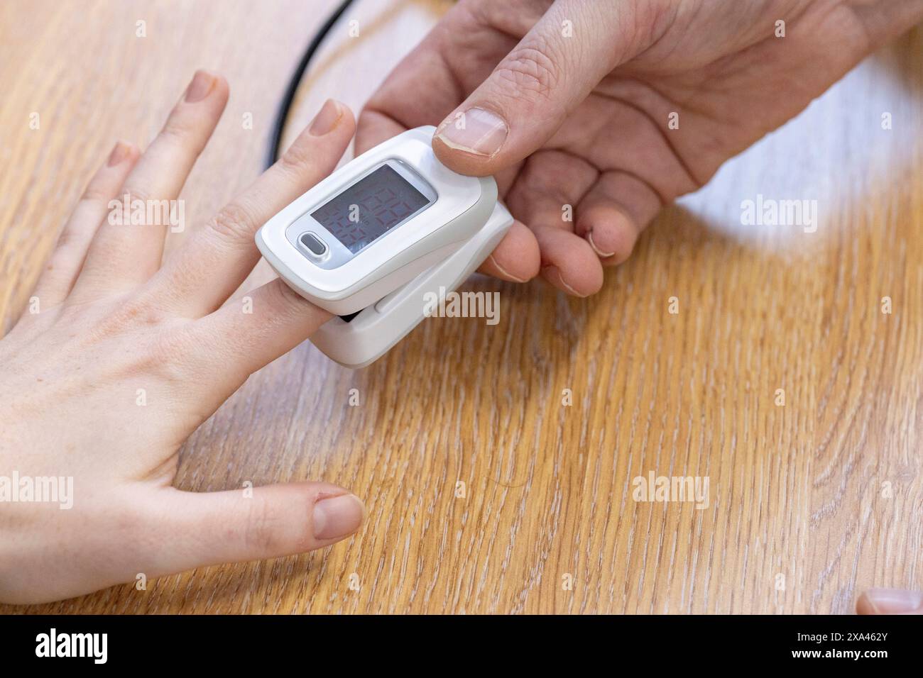 Checking oxygen saturation heart hi-res stock photography and images ...