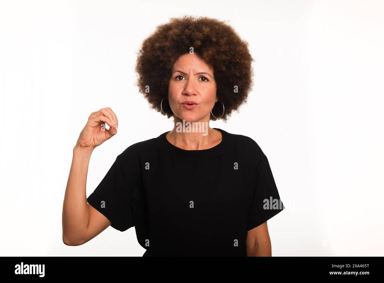 Female interpreter of the Brazilian sign language, Libras, making the ...