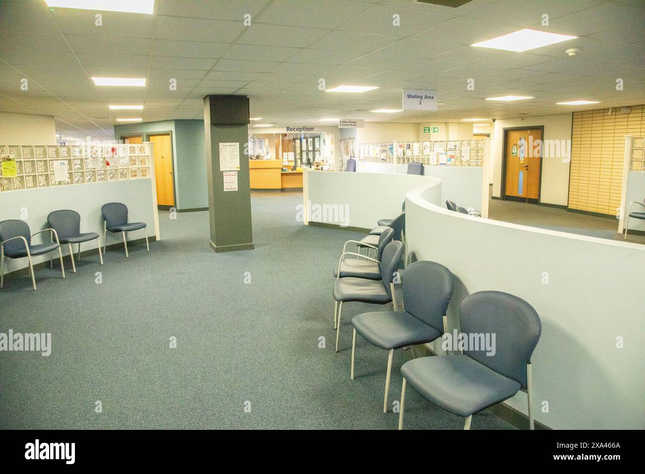 Interior view of a modern reception area with seating in a medical ...