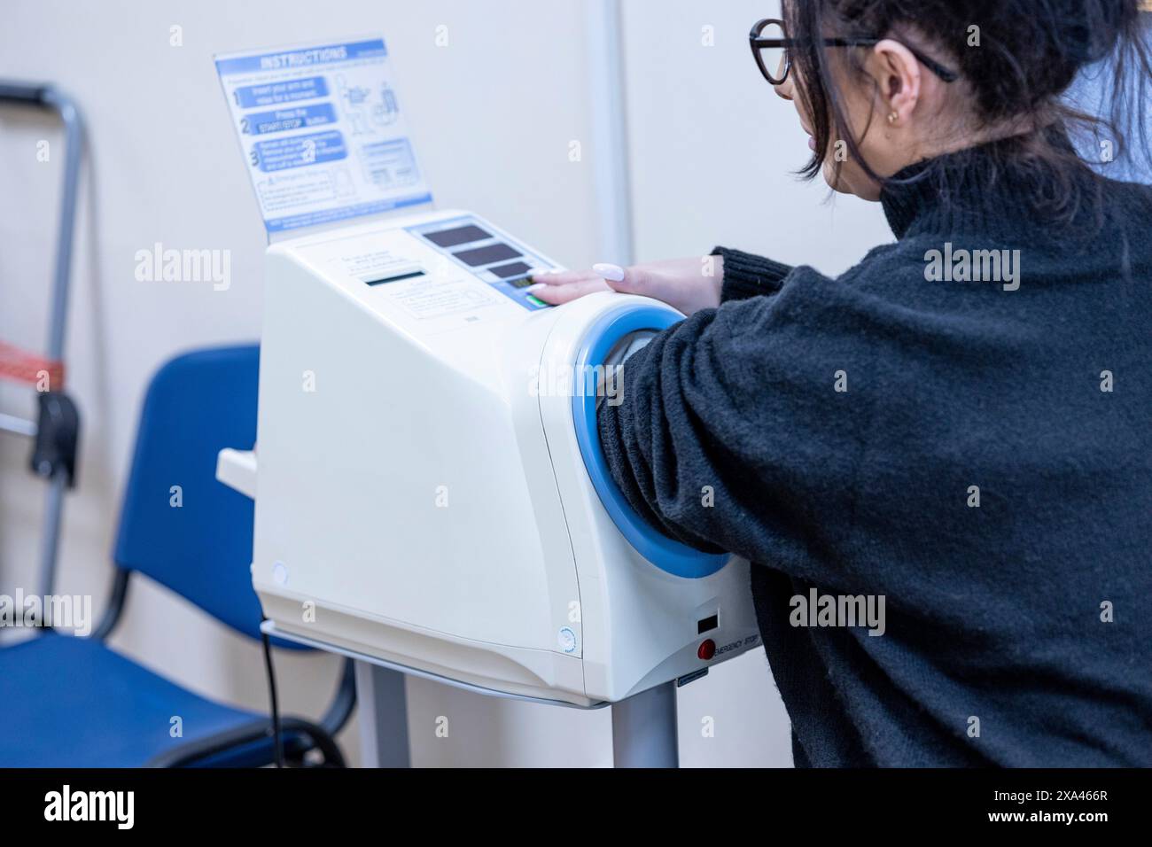 Healthcare professional using device hi-res stock photography and ...