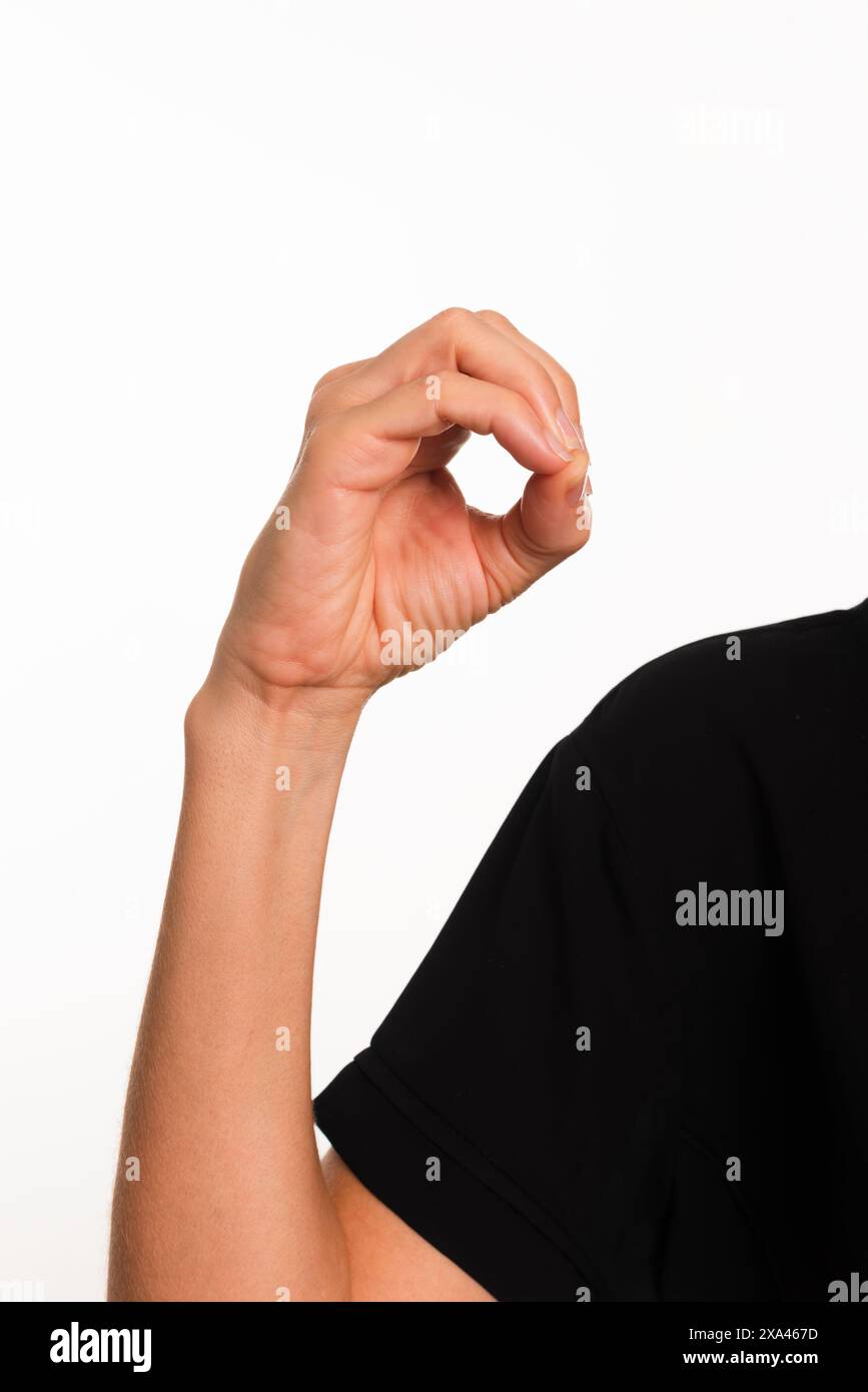 Close-up of a hand making the letter O in the sign language for the ...