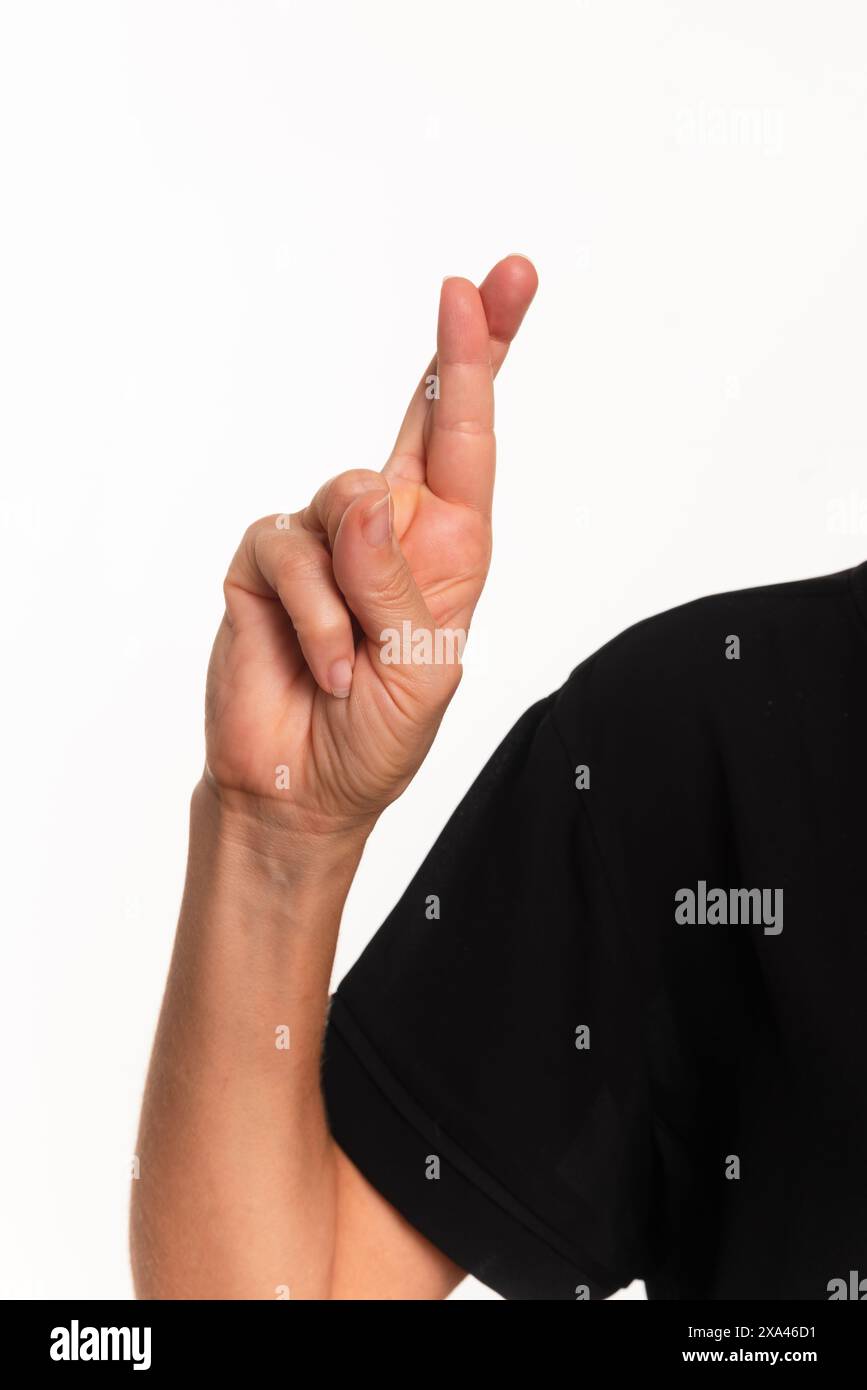 Close-up of a hand making the letter R in Brazilian sign language for ...