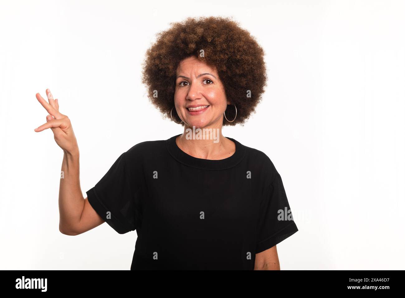 Female interpreter of the Brazilian sign language, Libras, making the ...