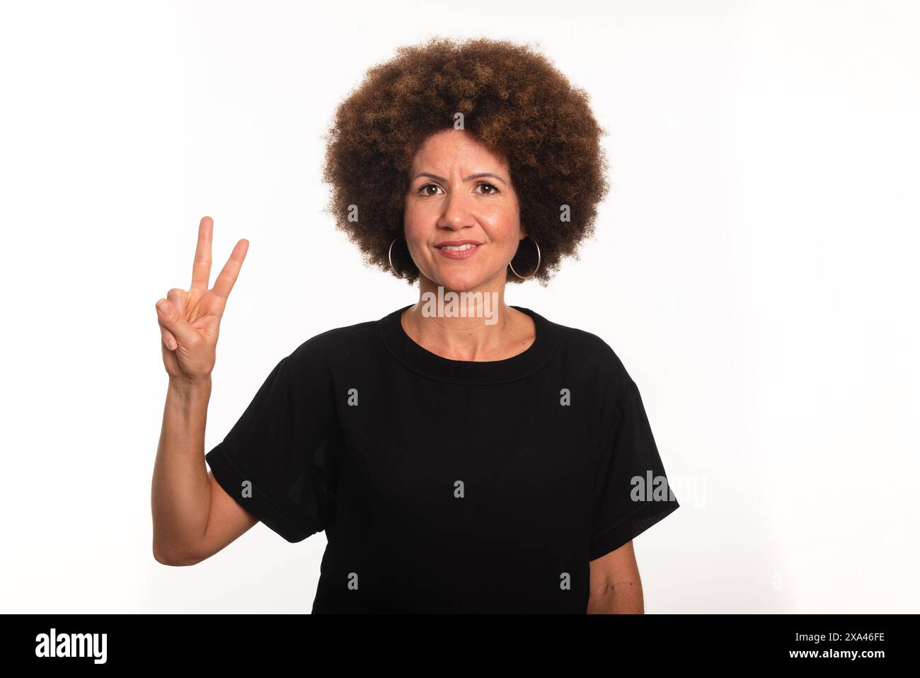 Female interpreter of the Brazilian sign language, Libras, making the ...