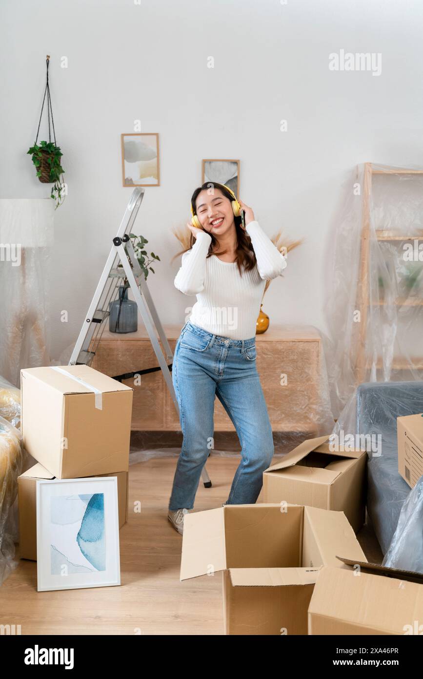 Young joyful woman dancing in hi-res stock photography and images - Alamy