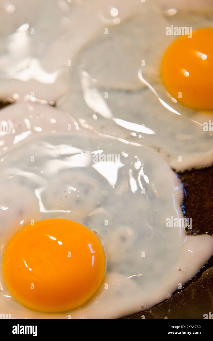 Close up of fried eggs sunny side up Stock Photo - Alamy