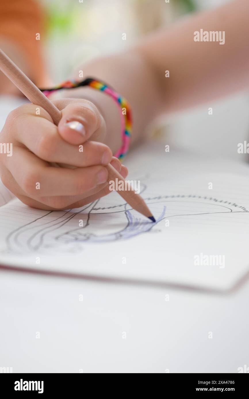Close up of Girl's Hand Drawing Stock Photo - Alamy