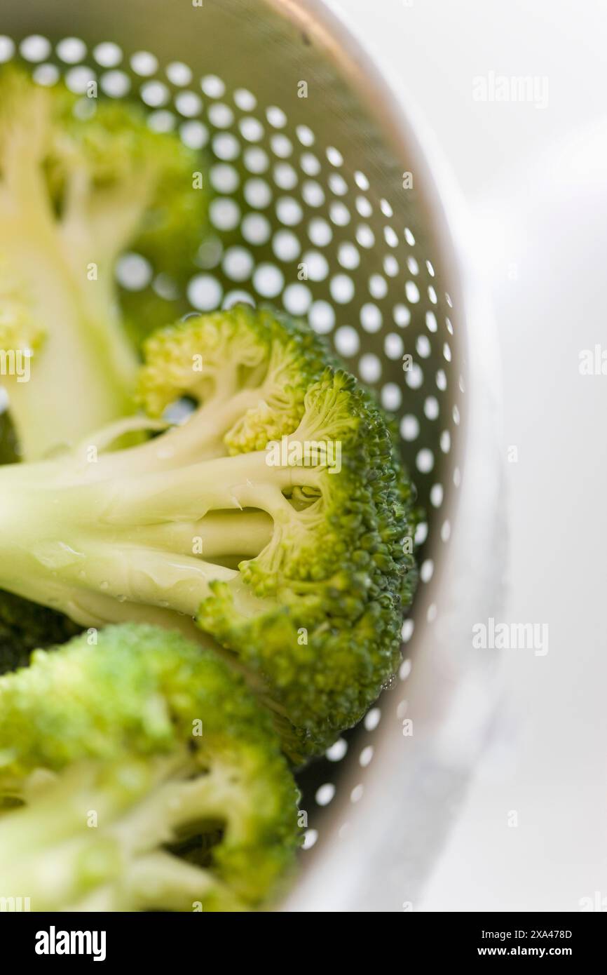 Broccoli Florets in a Colander Stock Photo - Alamy