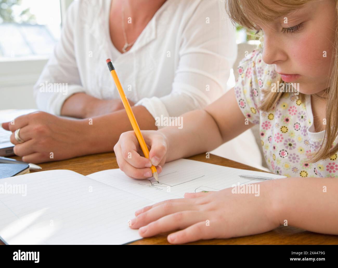 Young Girl Drawing Stock Photo - Alamy
