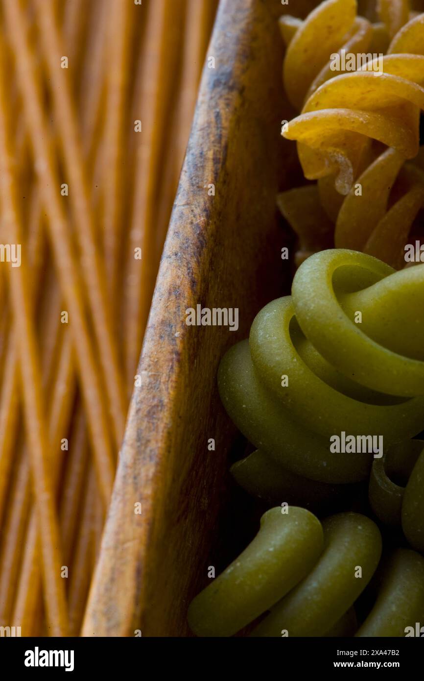 Green and Whole Wheat Pasta in Wooden Drawer Stock Photo - Alamy