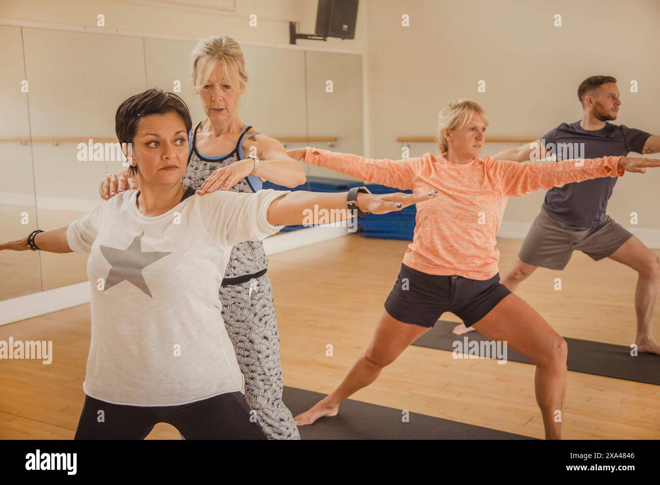 Group four people practicing yoga hi-res stock photography and images ...