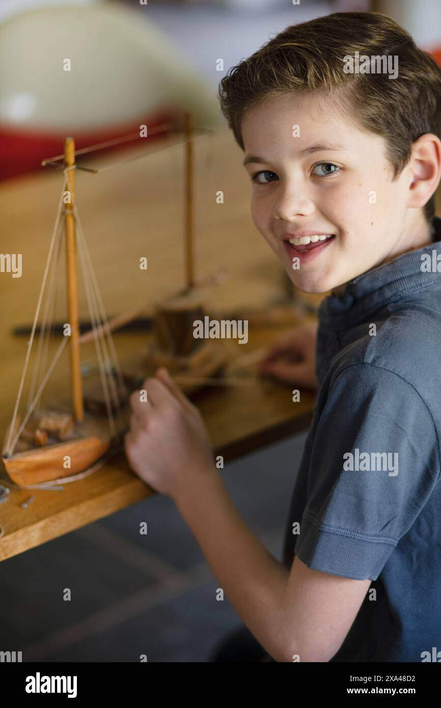 Boy Building Model Ship Stock Photo - Alamy
