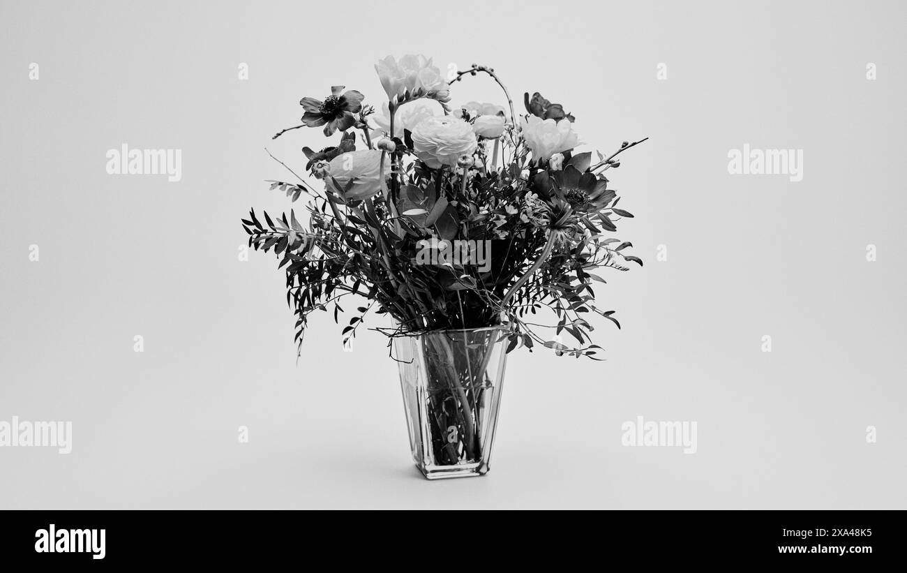 Beautiful flower arrangement in vase on white background Stock Photo ...