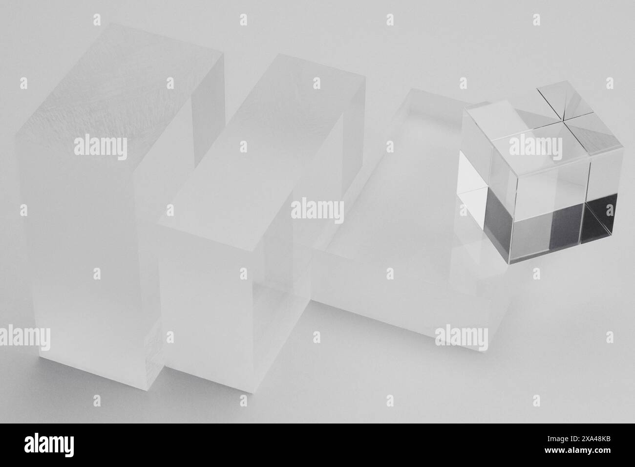 Still life reflective cube on frosted glass block against white ...