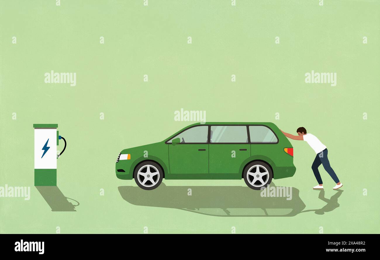Man pushing green electric car toward electric charging station Stock ...