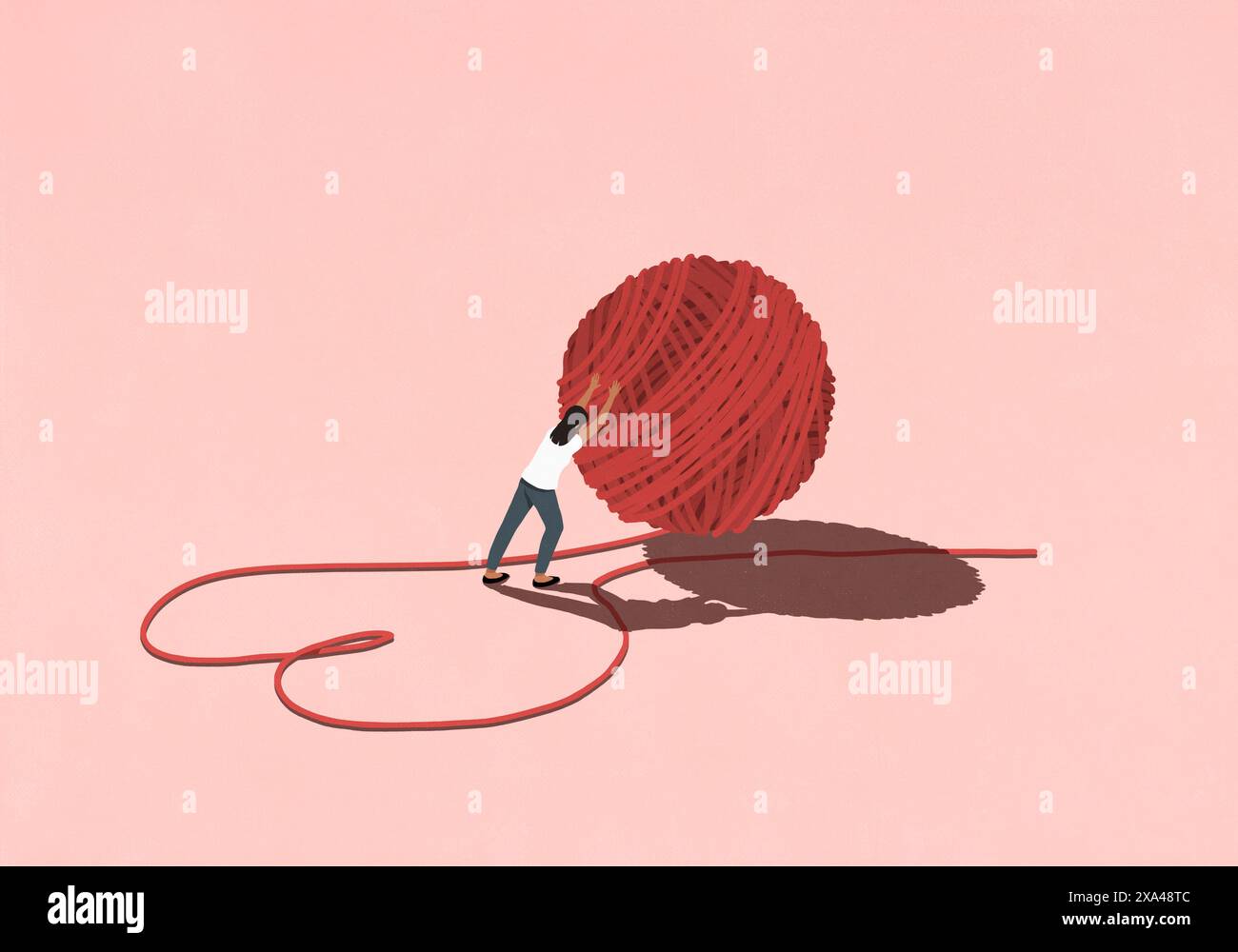 Woman pushing large ball of red string forming heart-shape on pink ...