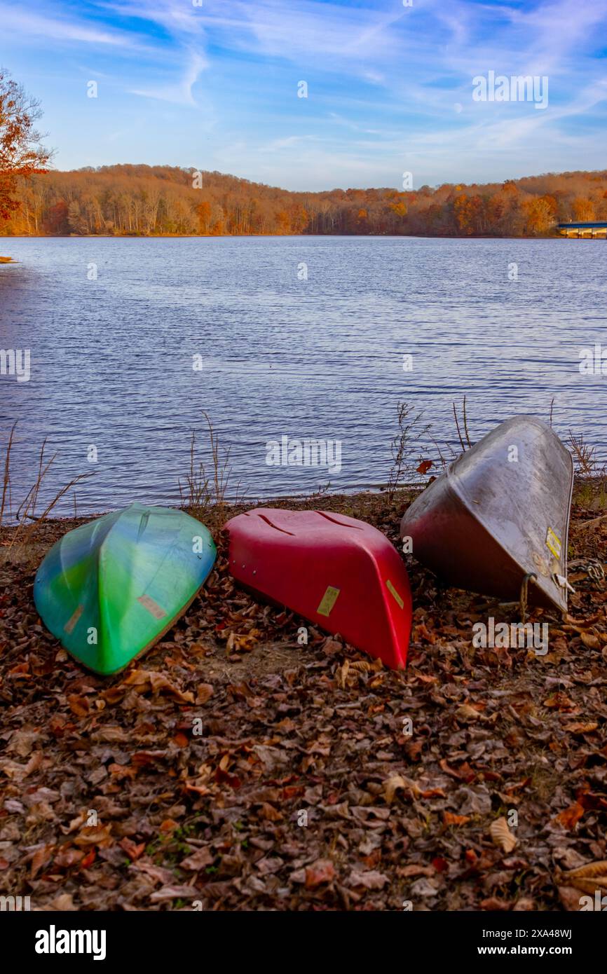 Three Canoes in the Fall Stock Photo - Alamy