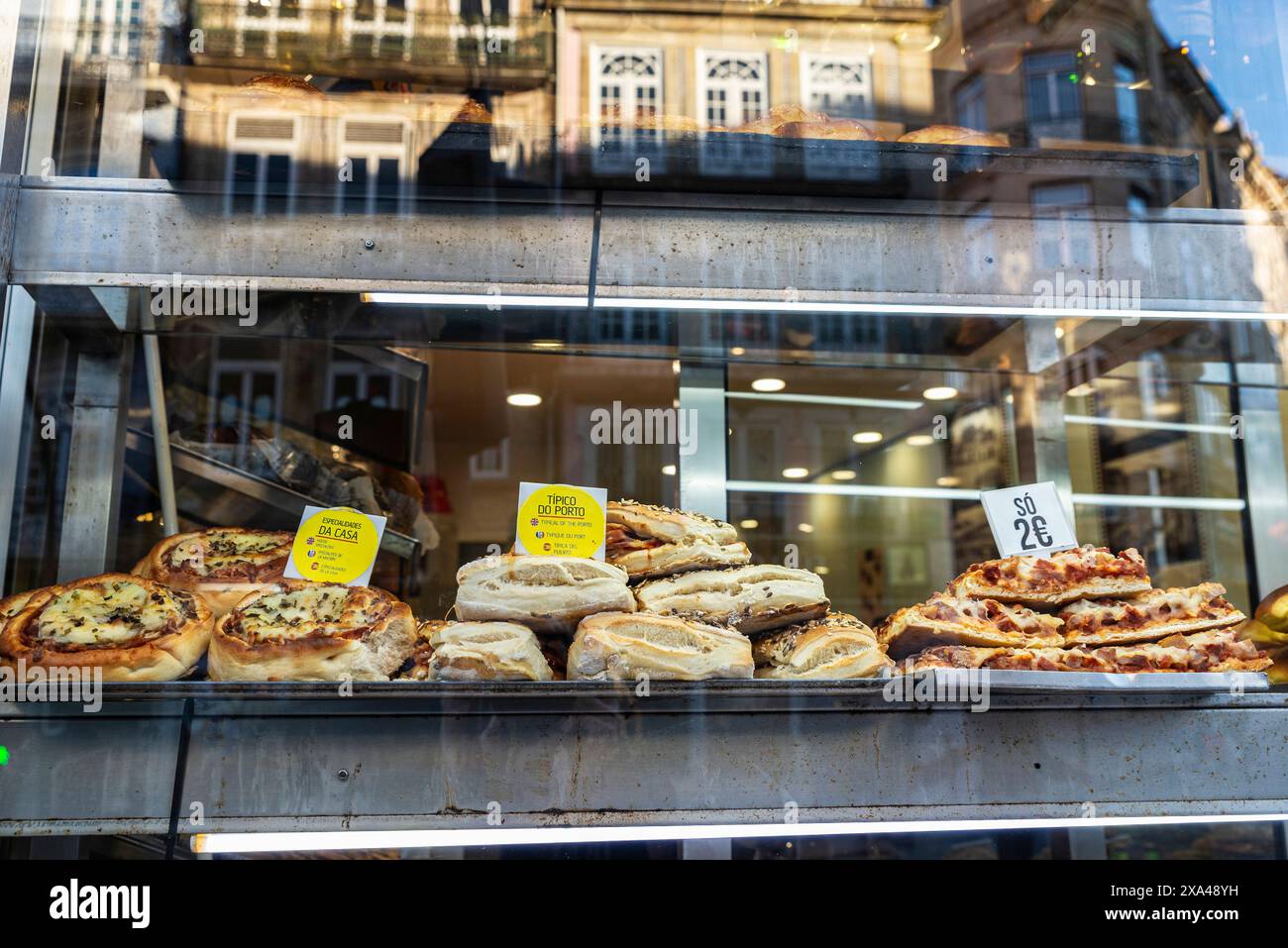 Display of a pastry and bakery shop with sandwich, frying and cake in ...