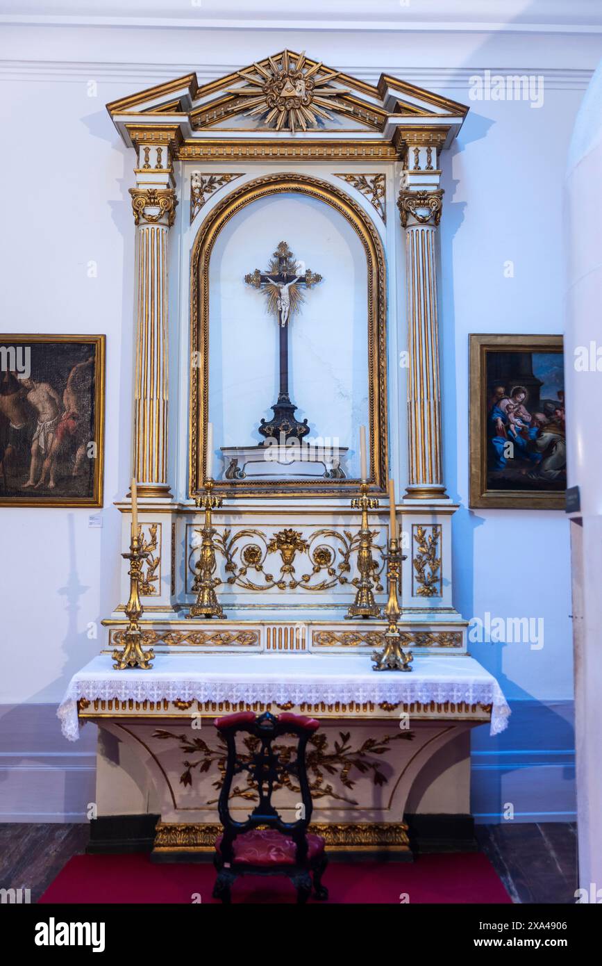 Altar with the crucifixion of Jesus Christ of the priest house in the ...