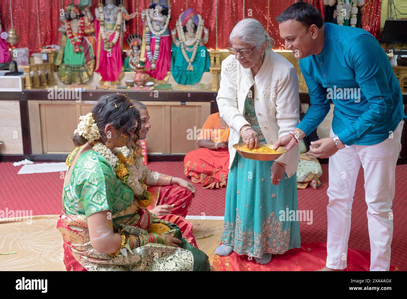 At the conclusuion of the Valaikappu ceremmony the mother to be's ...