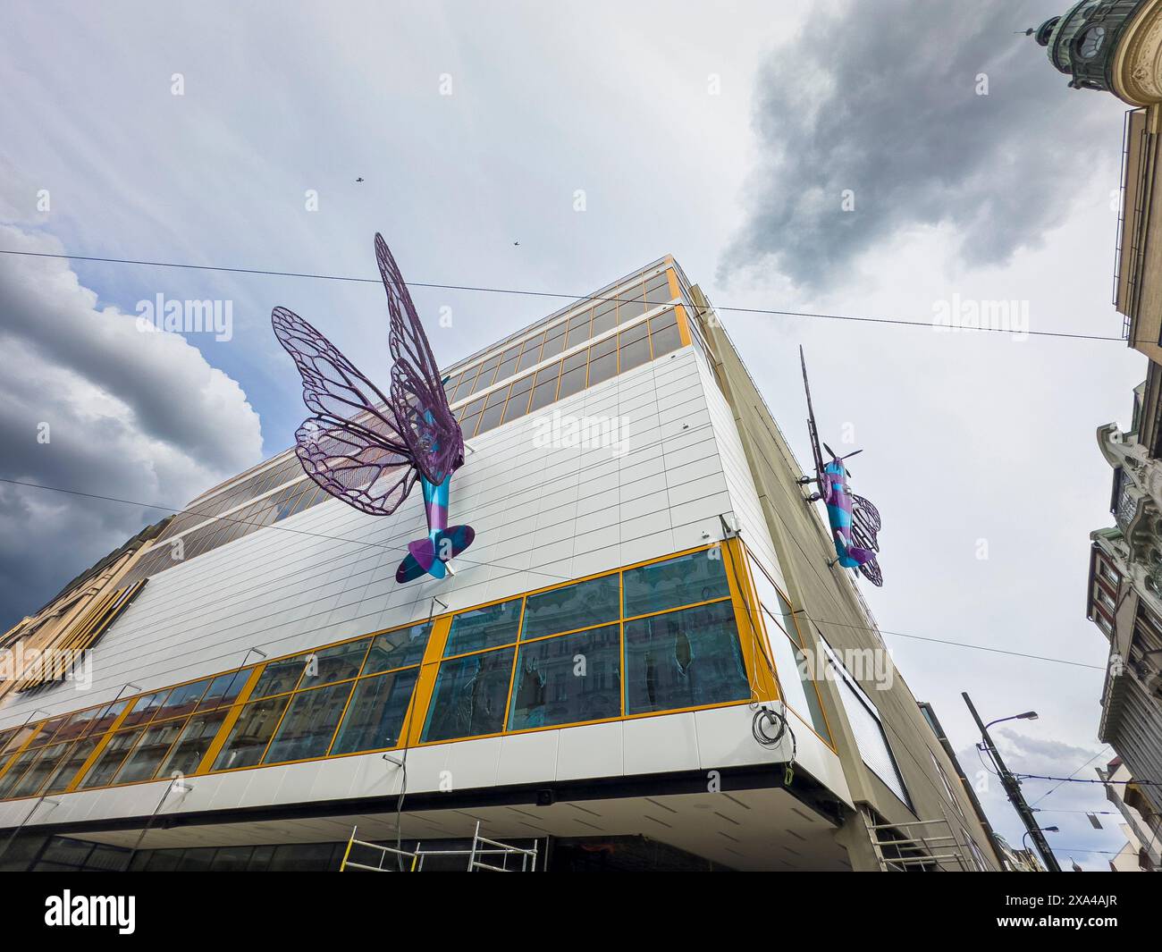 Installation of artworks on the facade of renovated Maj department ...