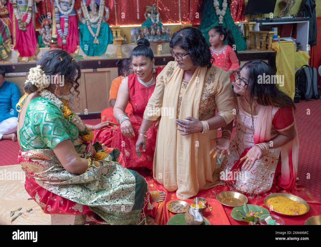 Scenes from a Valaikappu service with friends on the right and the ...