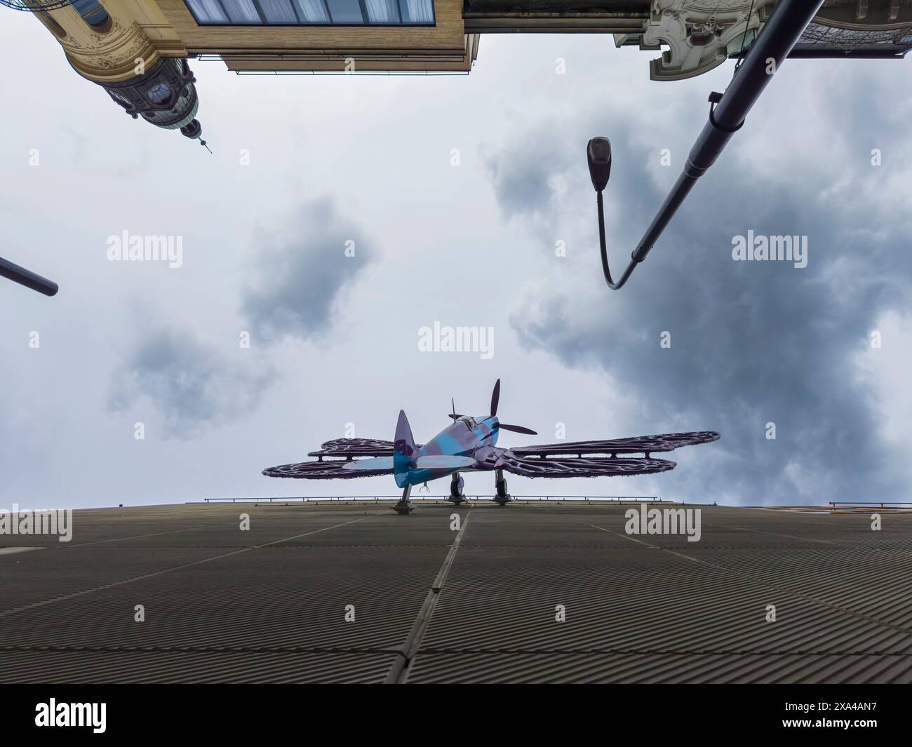 Installation of artworks on the facade of renovated Maj department ...