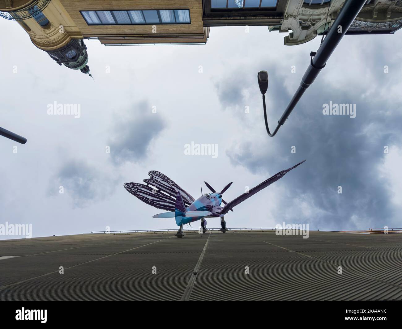 Installation of artworks on the facade of renovated Maj department ...