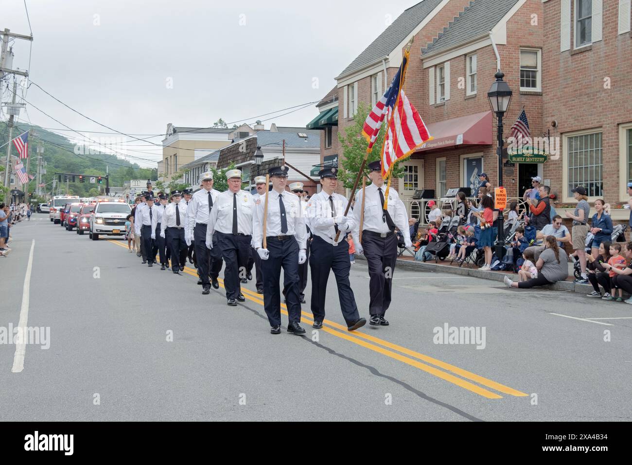 Men & women of the Chappaqua volunteer fire department march in the ...