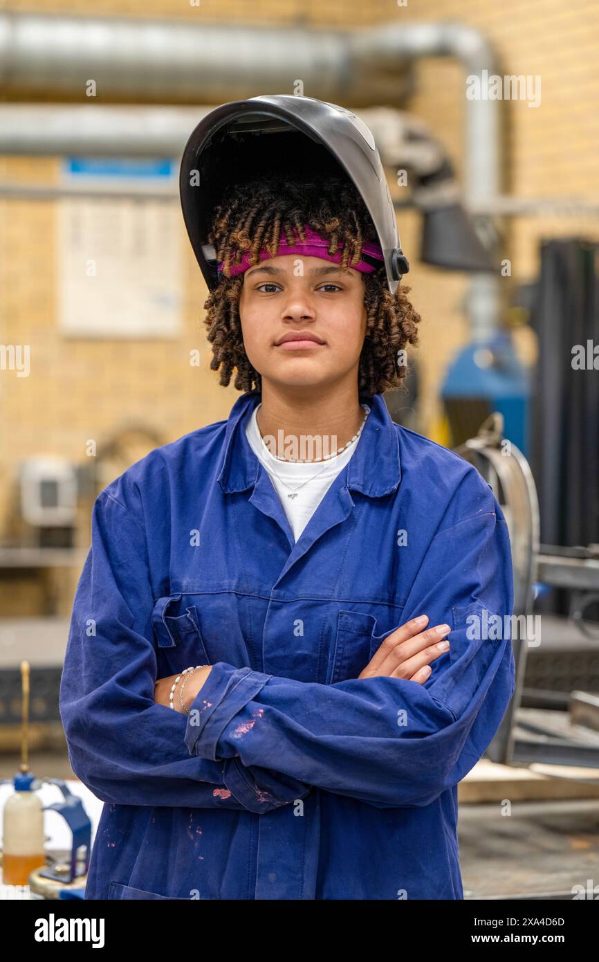 Worker wearing helmet hi-res stock photography and images - Alamy