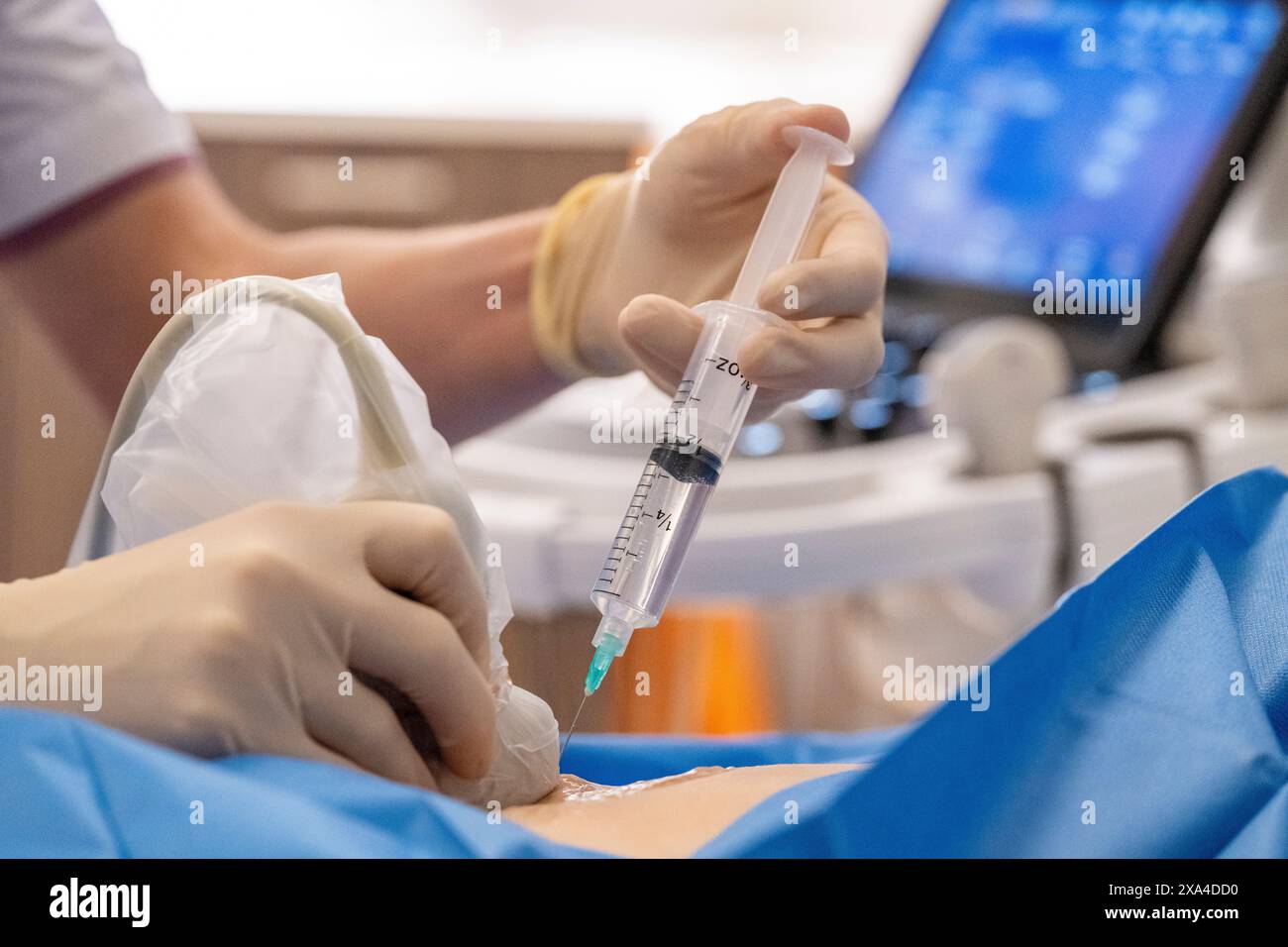 Close up hands performing injection syringe hi-res stock photography ...