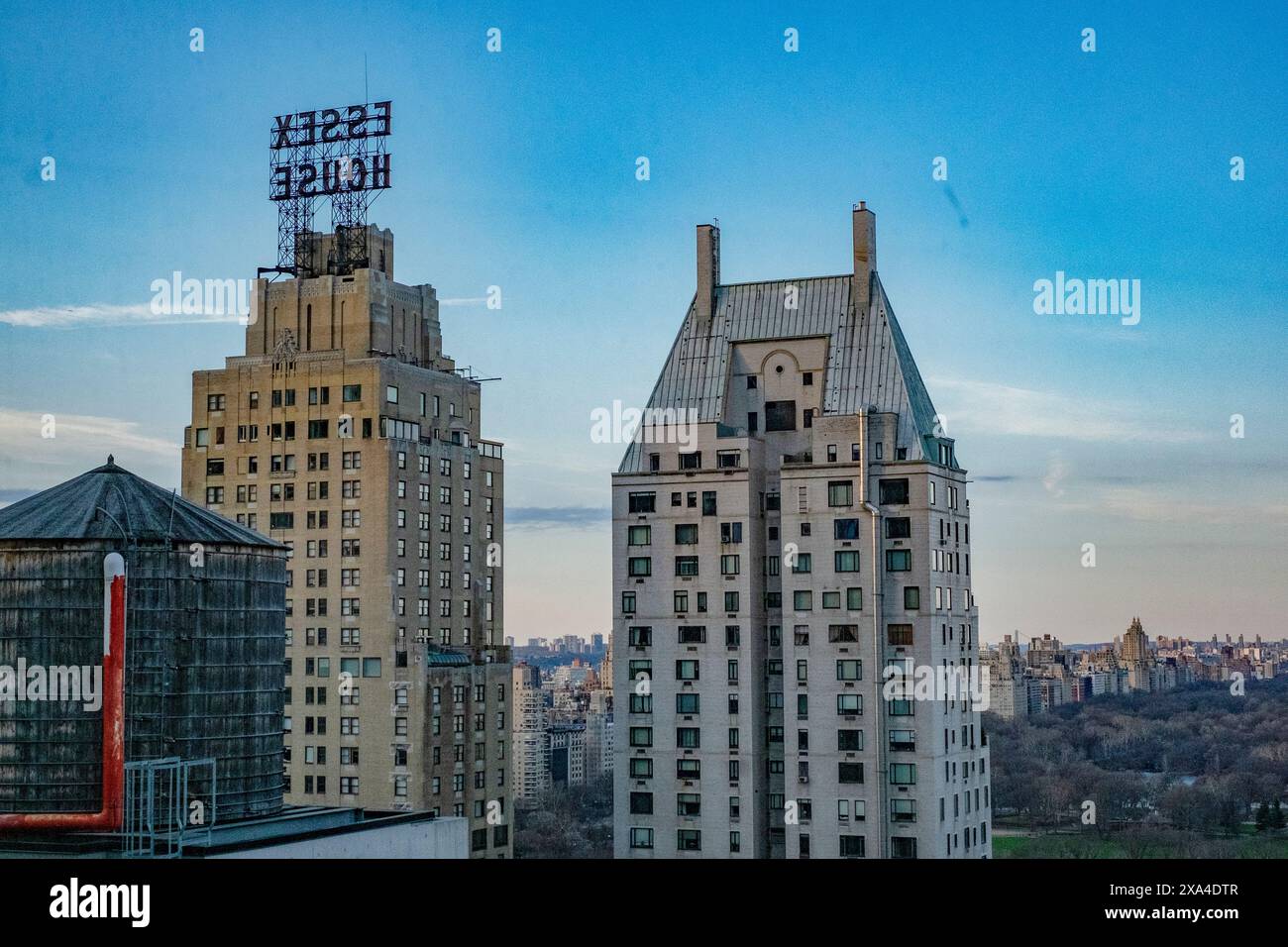 The image showcases a cityscape featuring two prominent buildings with ...