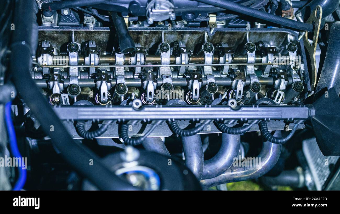 Broken valvetrain on older type engine. Aluminium head with broken ...