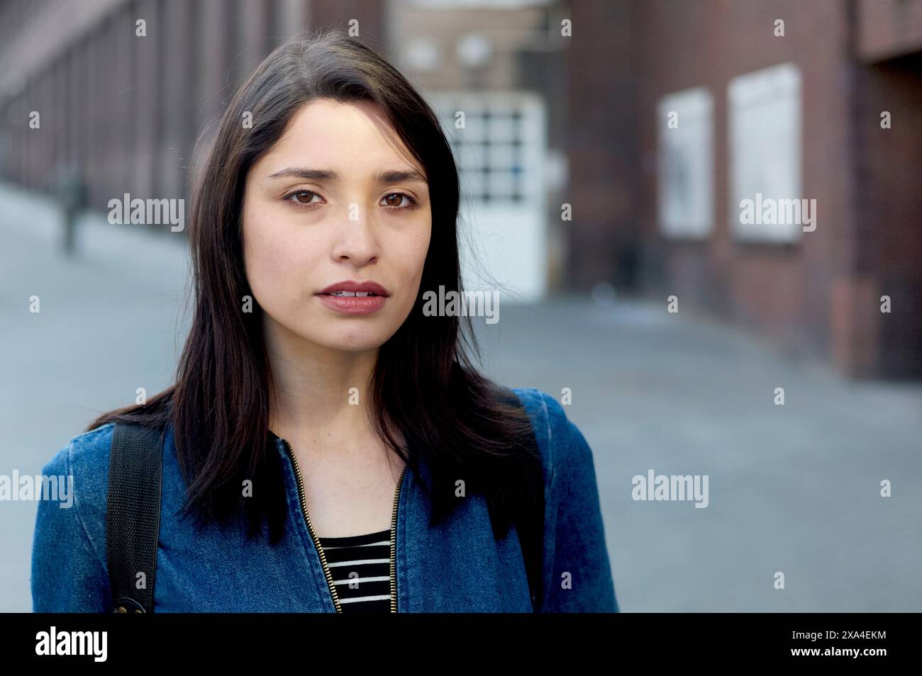 Blue jacket over striped top hi-res stock photography and images - Alamy