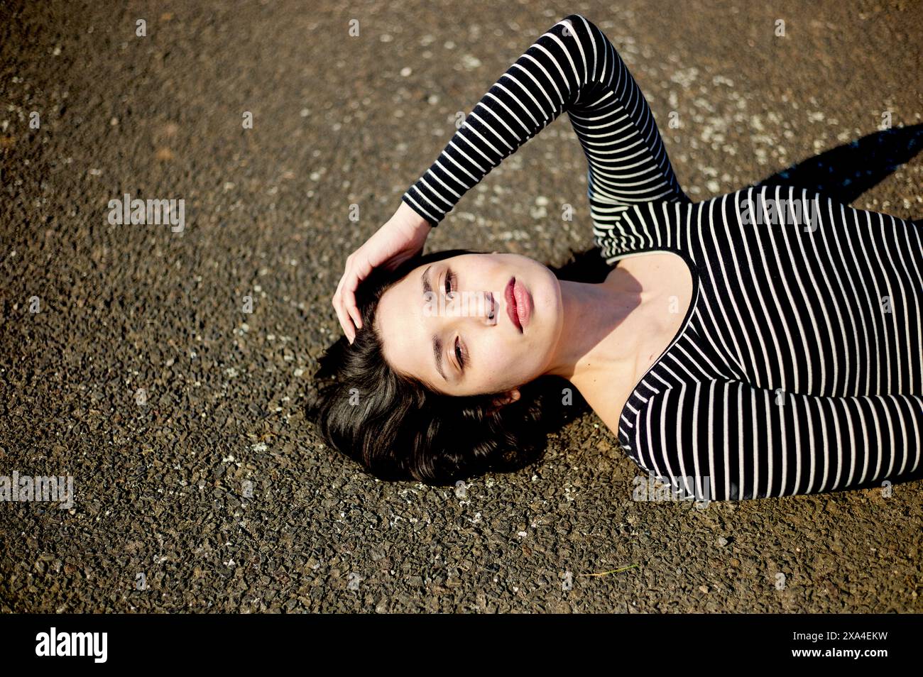 Woman resting head on hand hi-res stock photography and images - Alamy