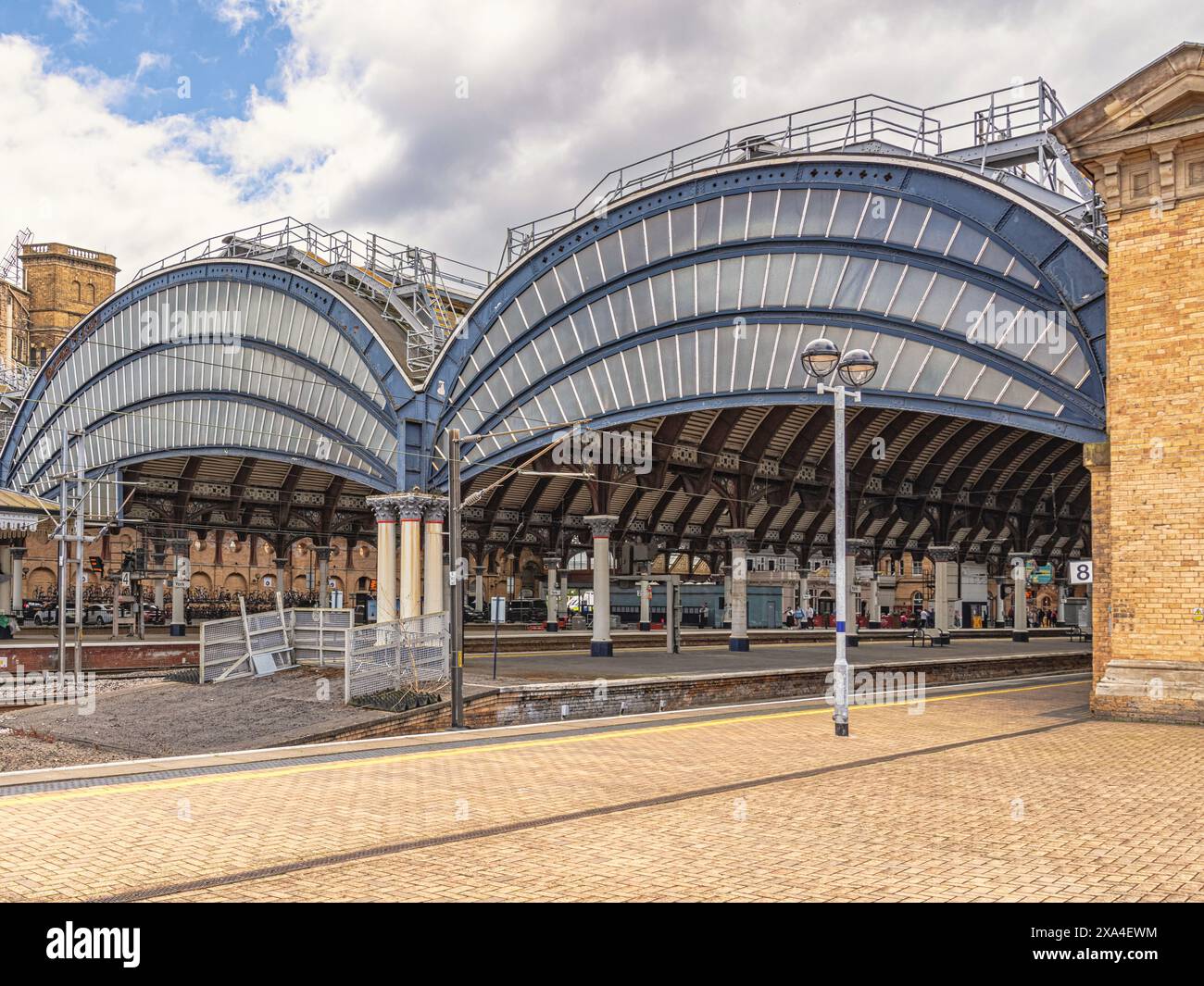 Two historic arches, supported by architectural columns, cover the ...