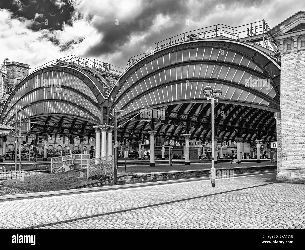 Two historic arches, supported by architectural columns, cover the ...