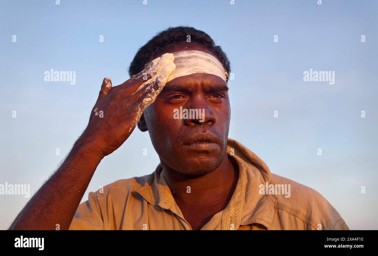 Aboriginal Yolngu man with tribal paint, often used when performing ...
