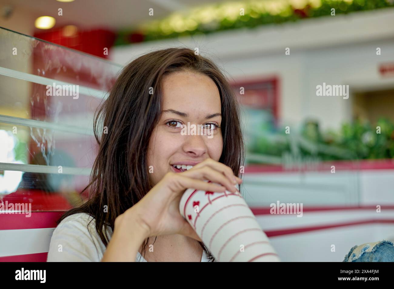 Resting chin hands subtle smile hi-res stock photography and images - Alamy