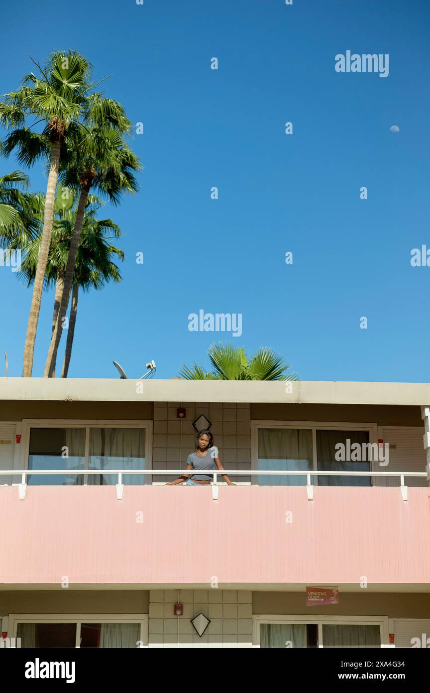 Person leans on balcony railing hi-res stock photography and images - Alamy